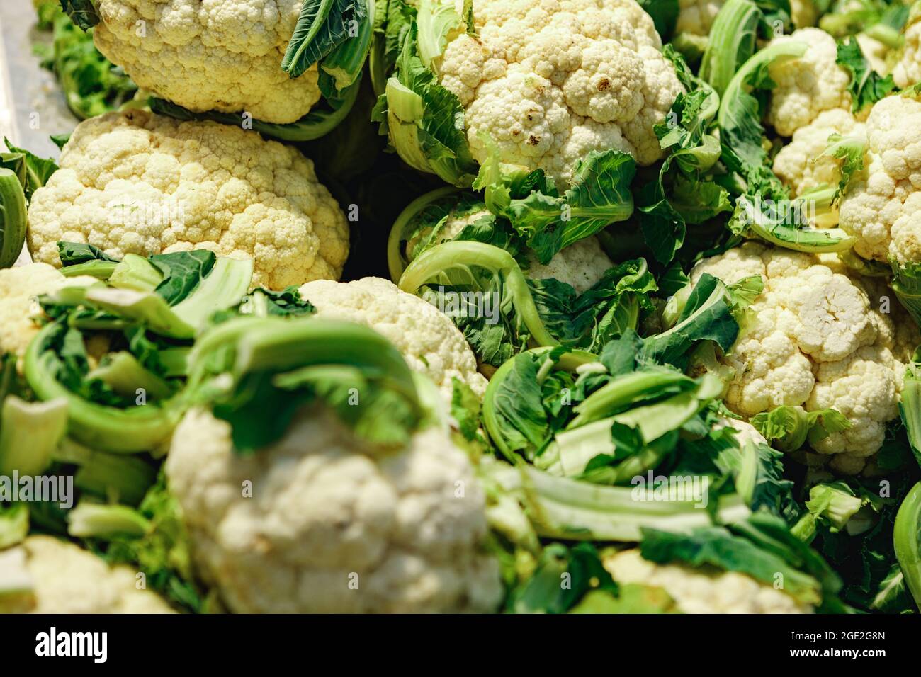 Ripe cauliflower in box on counter in supermarket Stock Photo - Alamy