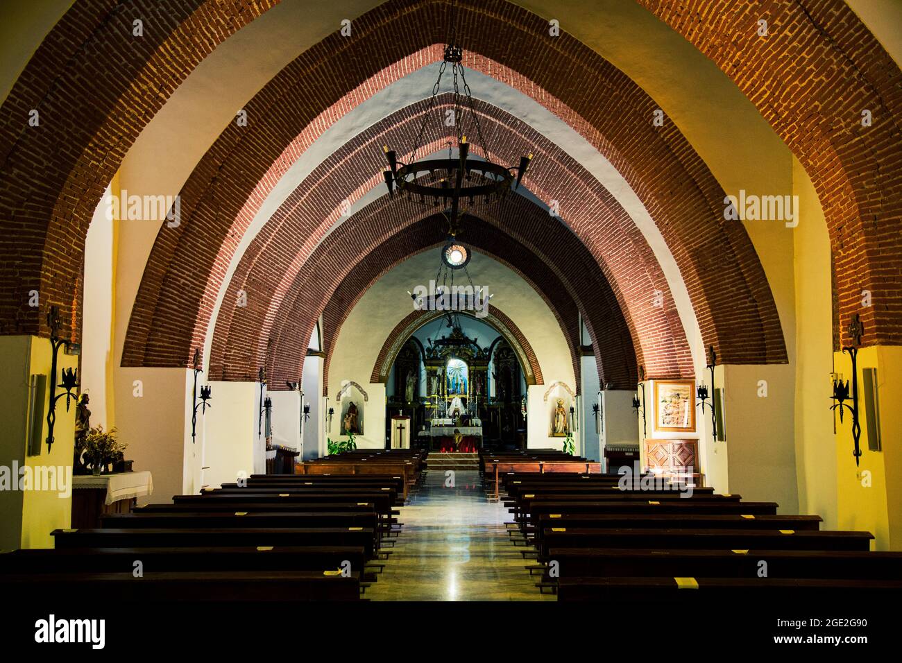 Romanesque church interior with pointed red brick arches Stock Photo ...