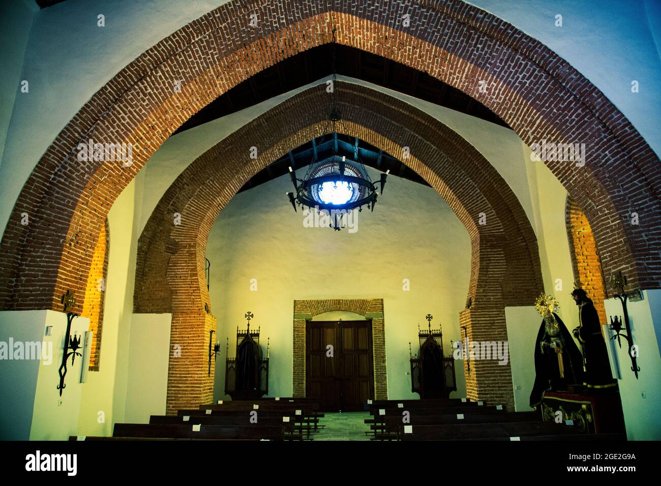 Romanesque church interior with pointed red brick arches Stock Photo ...