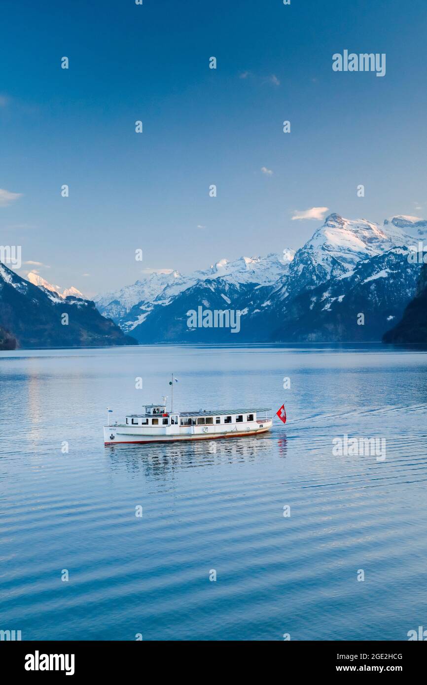 View from Brunnen on a ferry boat on Lake Uri in front of the mountains ...