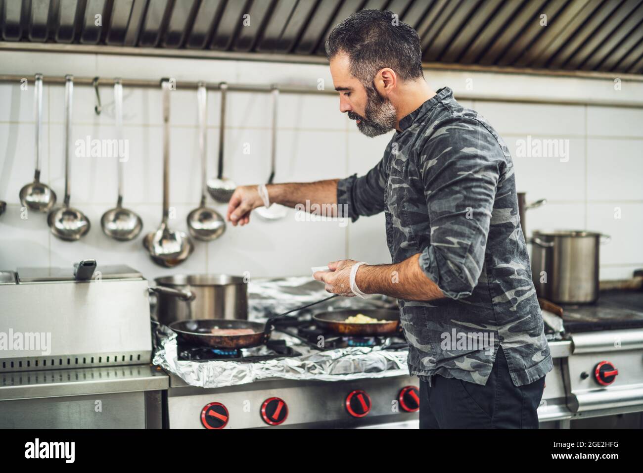 Salting food hi-res stock photography and images - Alamy