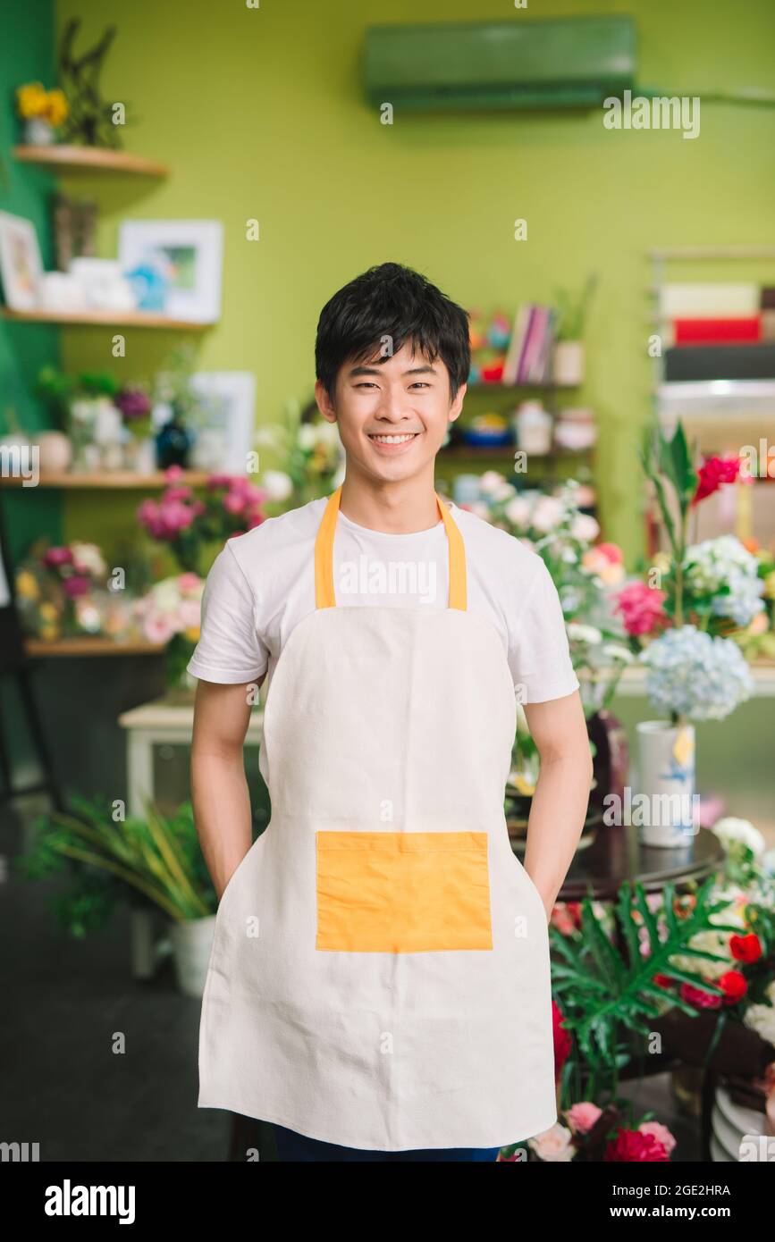 small business: happy owner of a flower shop Stock Photo - Alamy