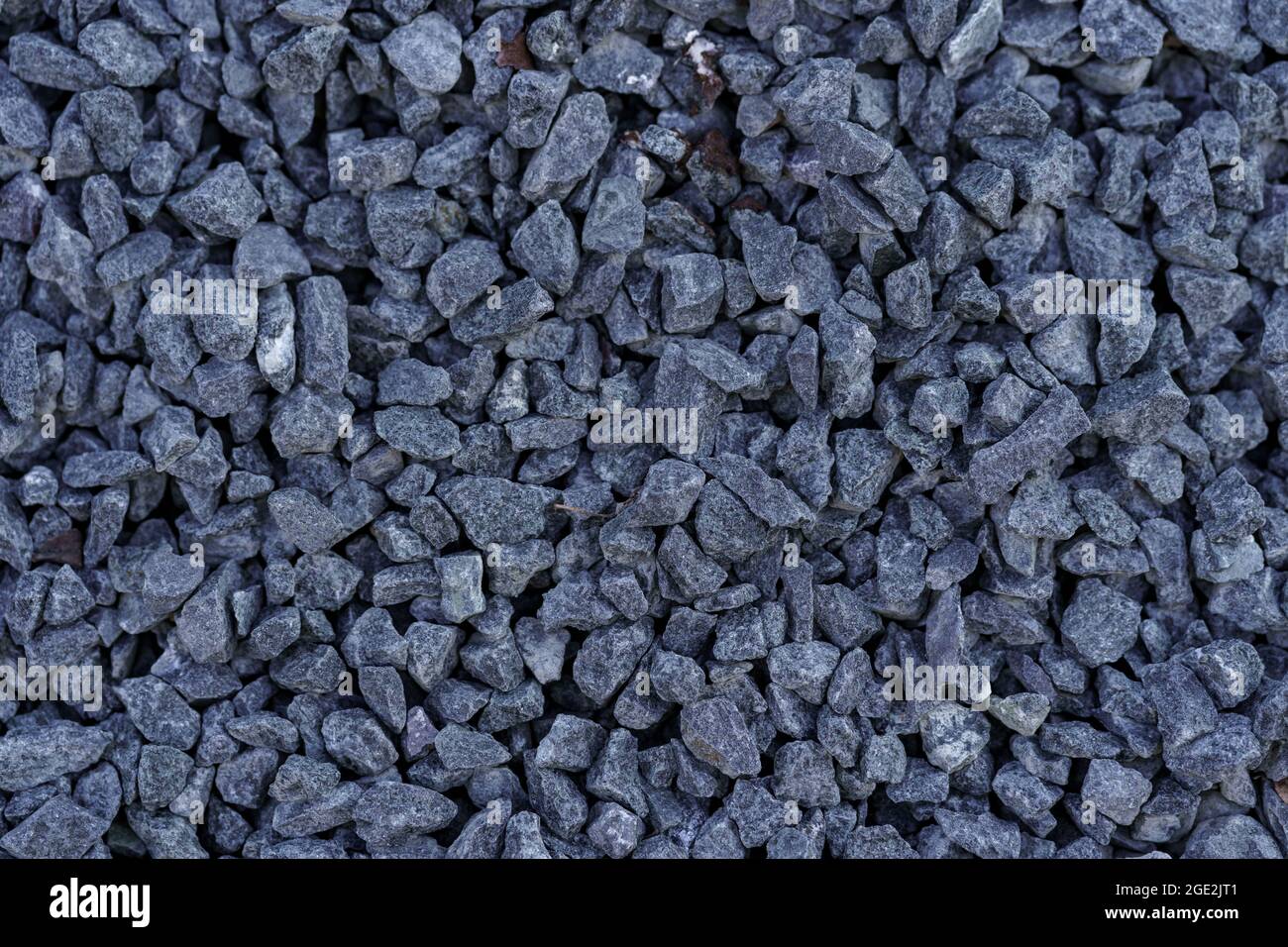 Gray small rocks ground texture. Dark gray small road stone background ...