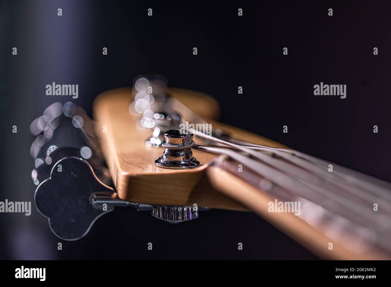 Tuning on a bass guitar hi-res stock photography and images - Alamy