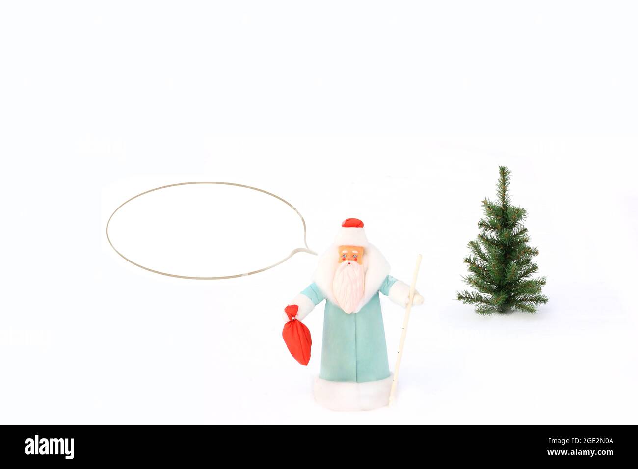 Christmas tree and santa claus on a white background Stock Photo - Alamy