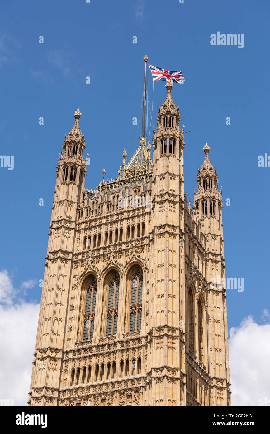Top of victoria tower with british flag hi-res stock photography and ...