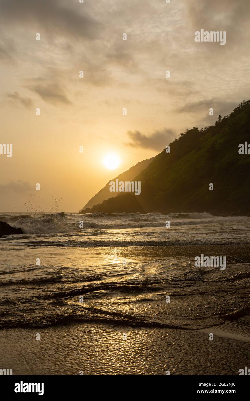 Beautiful and secluded Kakolem Beach during sunset in monsoon season at ...