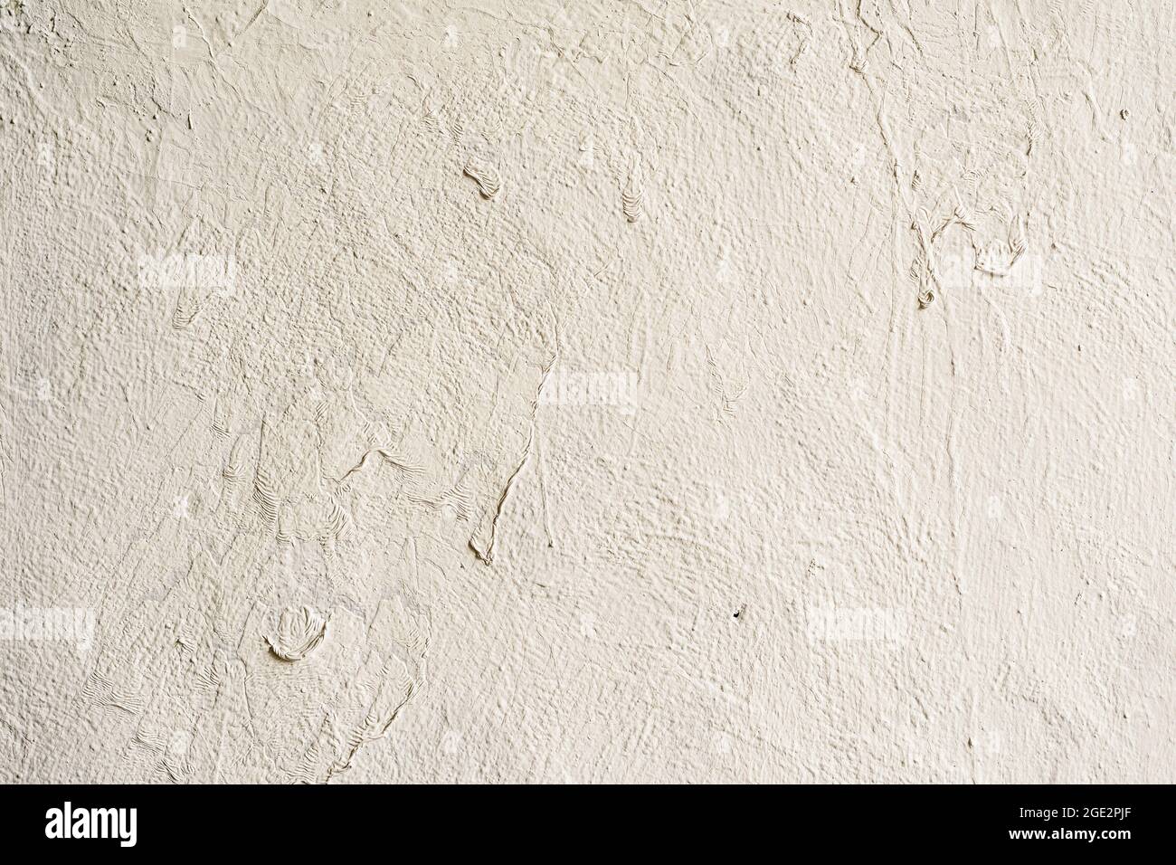 Painted rough plaster wall, creame color, scratched surface, vintage ...