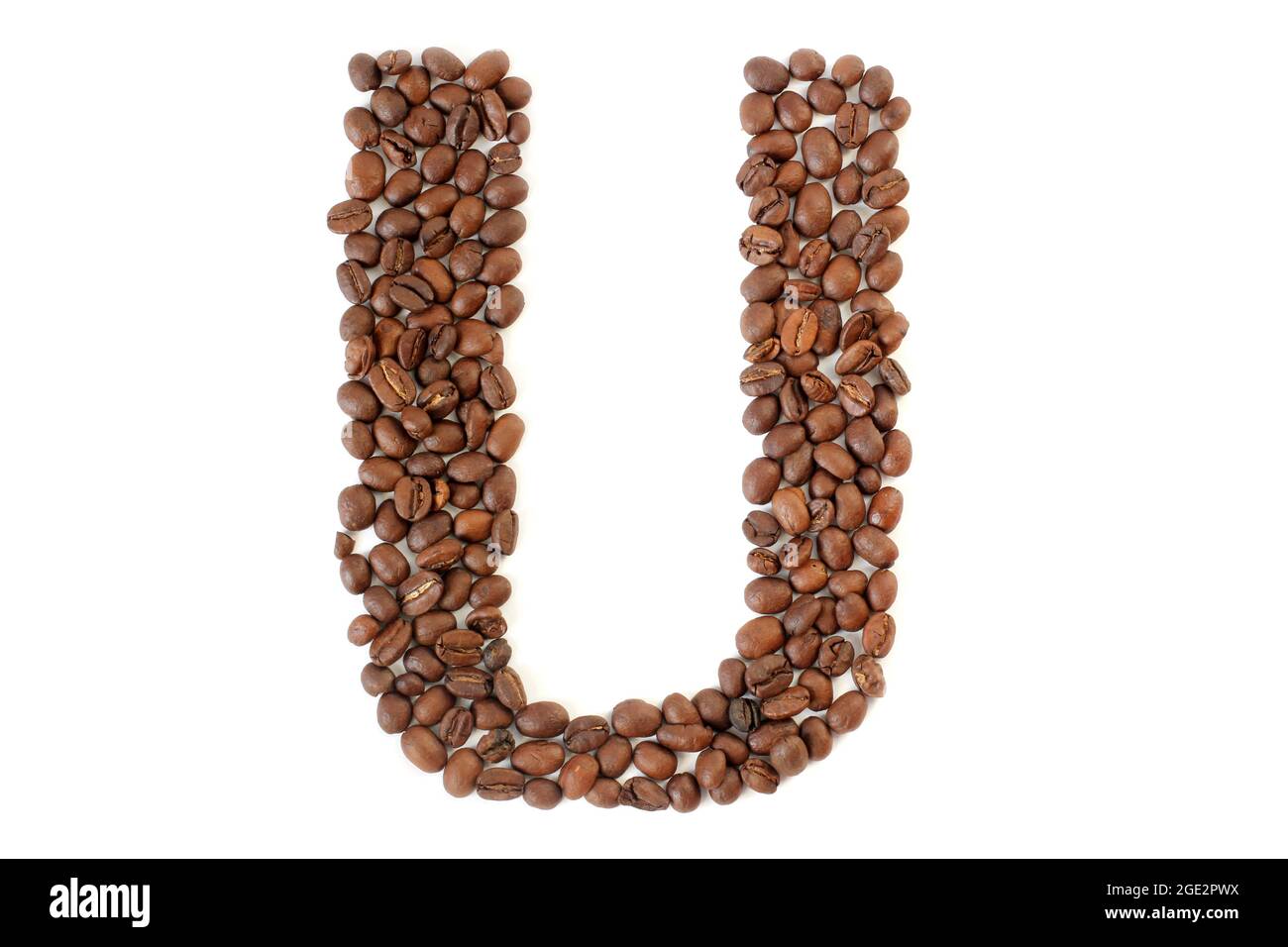 Coffee beans. Letter U made from coffee beans on a white background ...