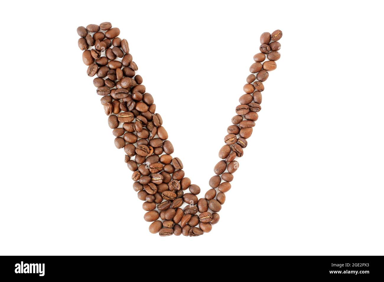 Coffee beans. Letter V made from coffee beans on a white background ...