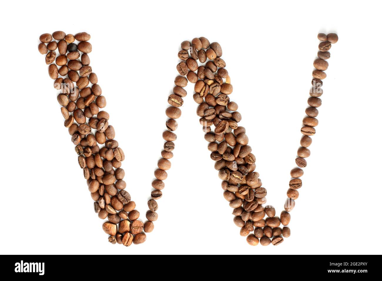 Coffee beans. Letter W made from coffee beans on a white background ...