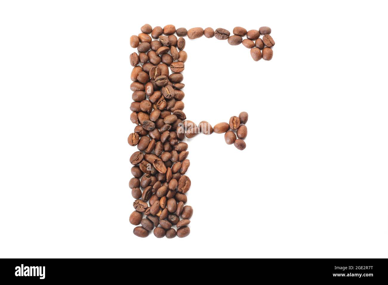 Coffee beans. Letter F made from coffee beans on a white background ...