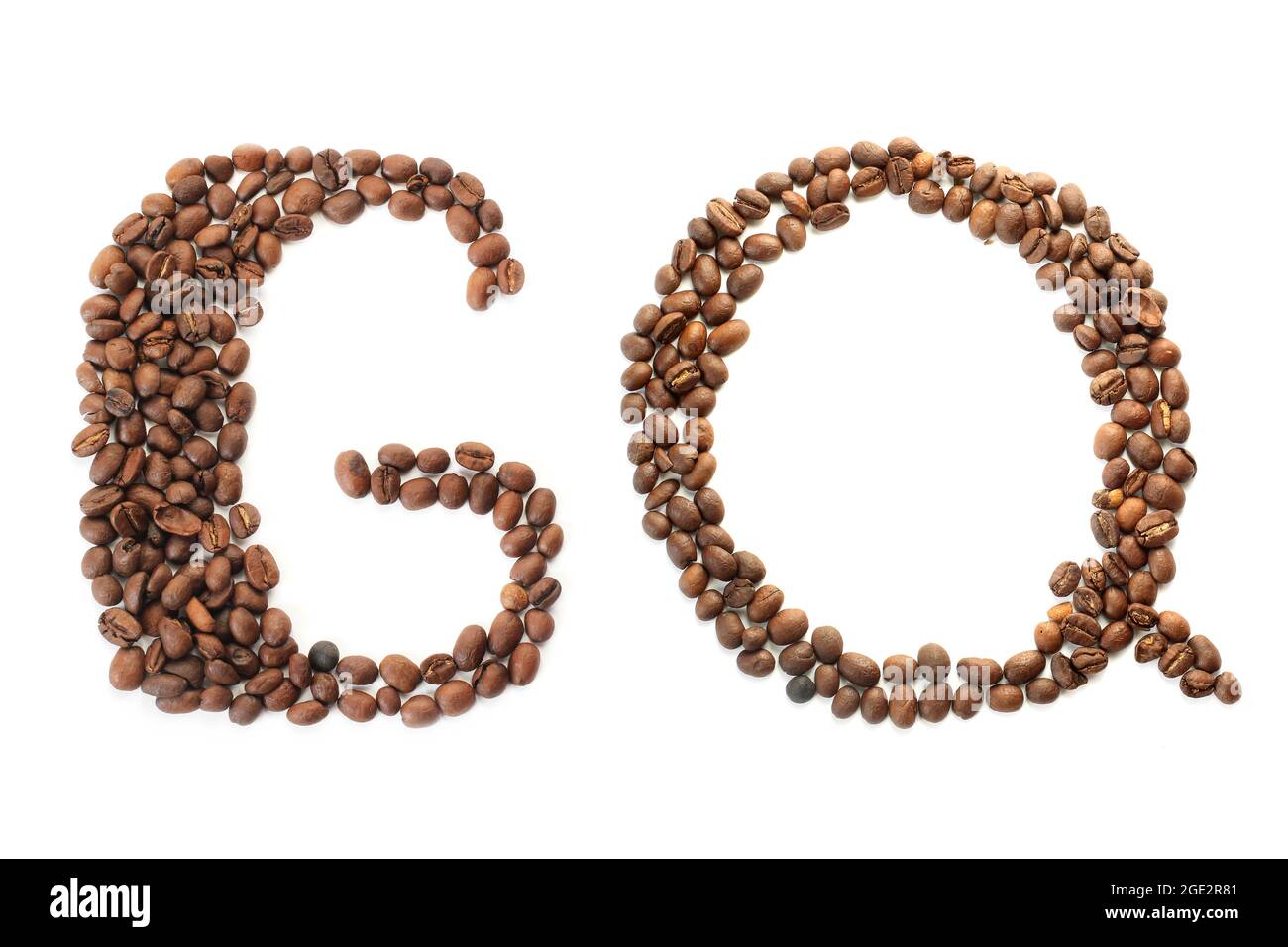 Coffee beans. The inscription GQ from coffee beans on a white ...