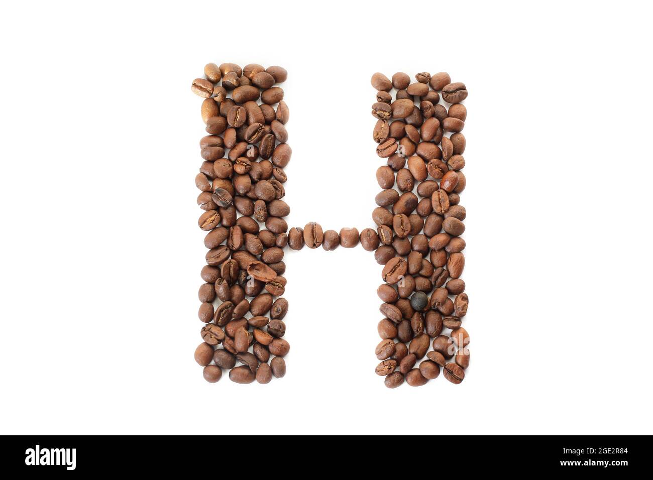 Coffee beans. Letter H made from coffee beans on a white background ...