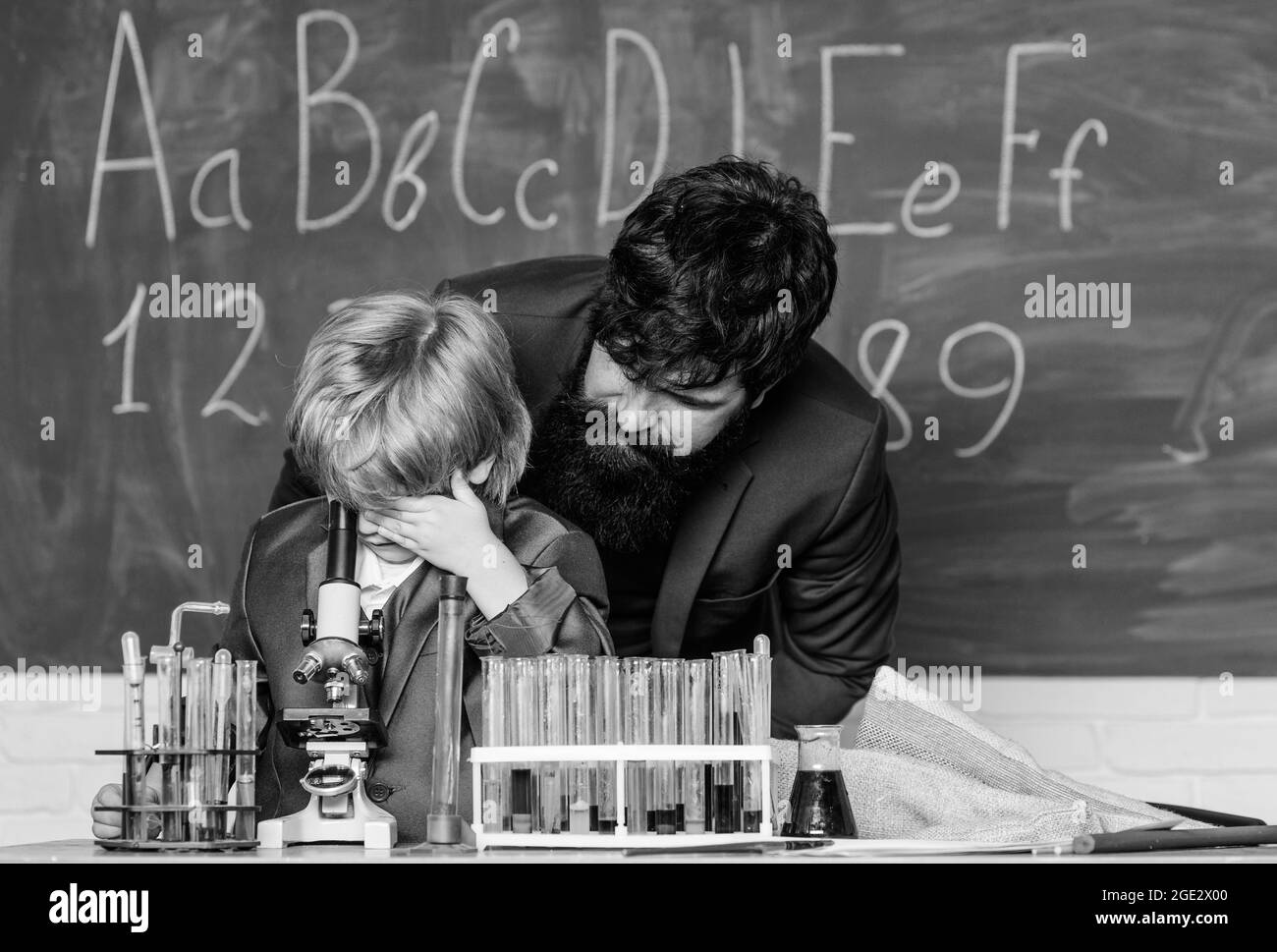 Your mind can think up great things. bearded man teacher with little ...