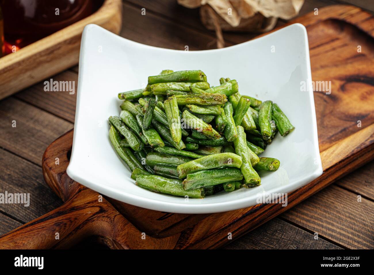 Plate of fried green string beans garnish Stock Photo - Alamy