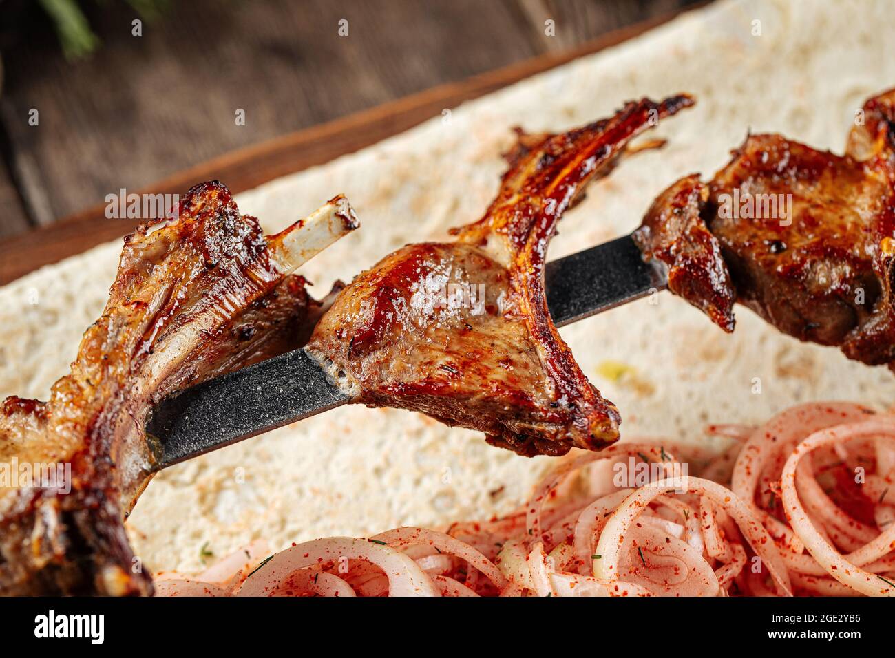 Grilled georgian lamb ribs shashlik skewers Stock Photo - Alamy