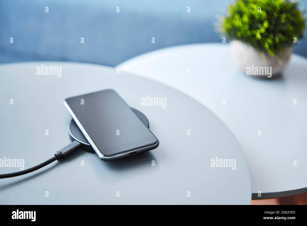 Wireless inductive charging smartphone battery. Electronic ...