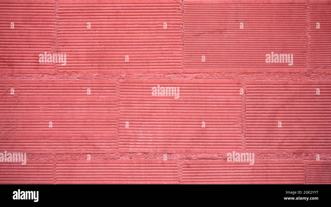 detail of a brick wall painted red Stock Photo - Alamy
