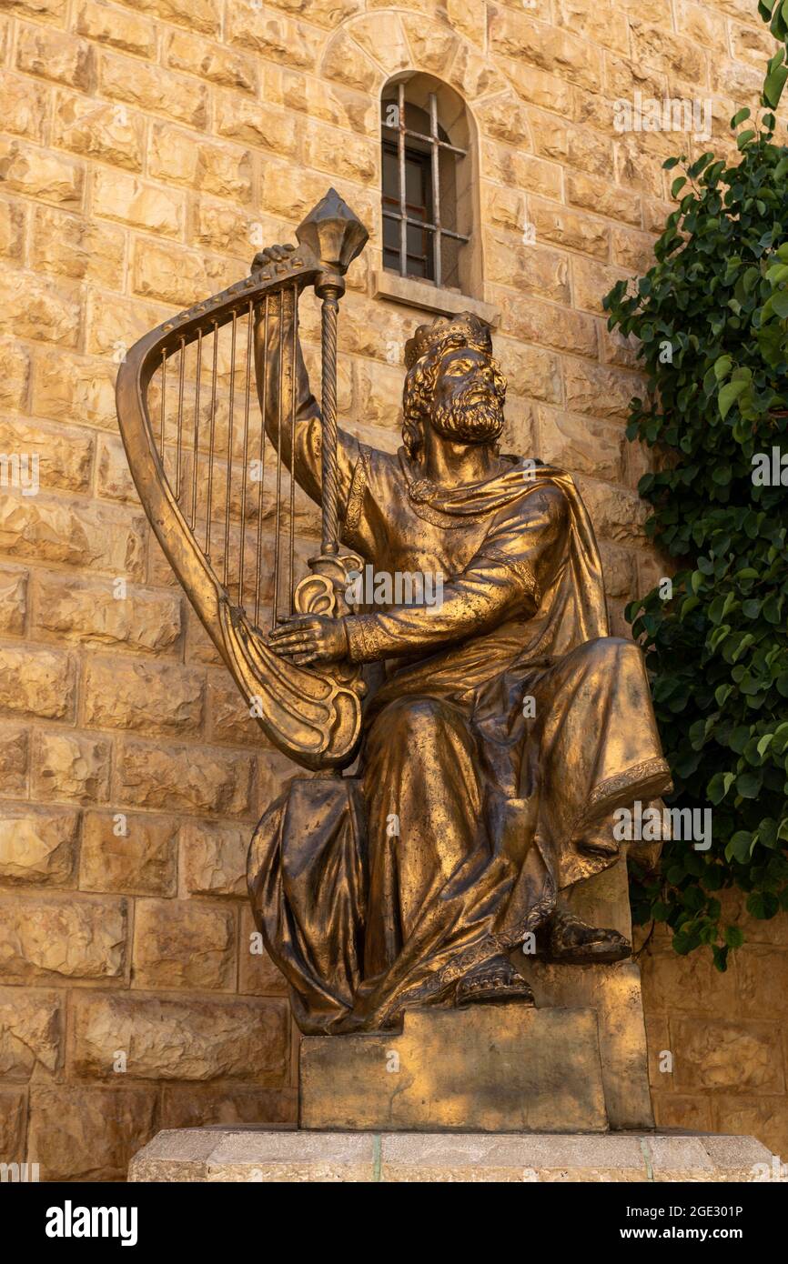 Statue of King David of Israel playing the harp, located near the ...