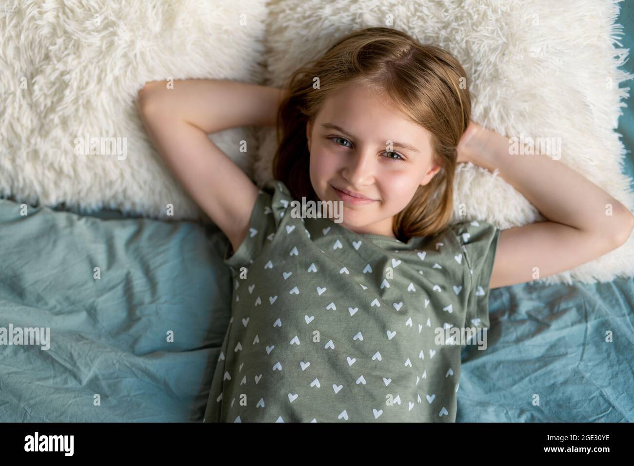 Portrait of preteen girl indoors Stock Photo - Alamy