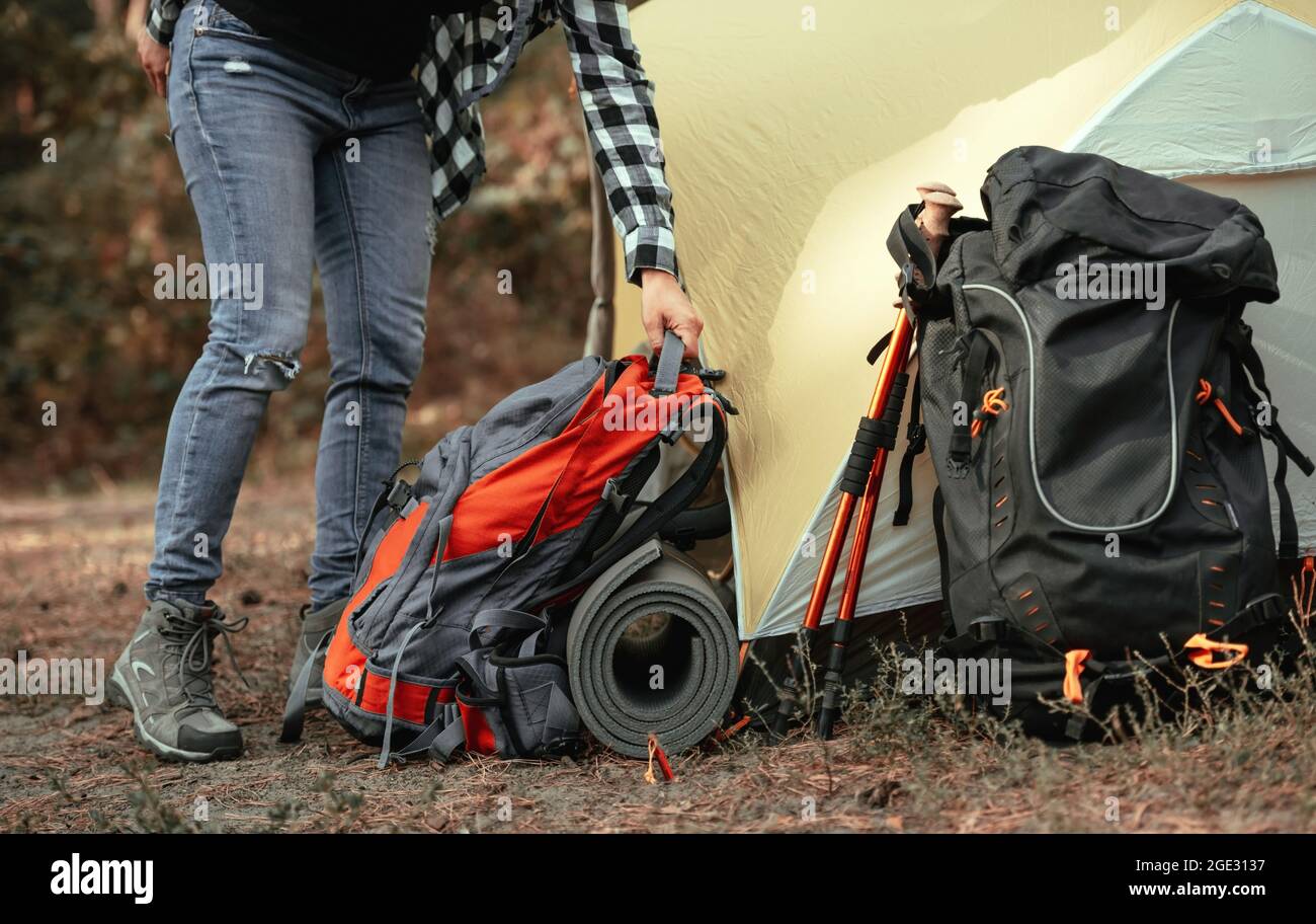 Backpack in camping in the forest Stock Photo - Alamy