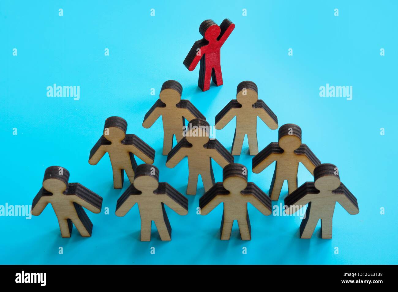 Leadership concept. Leader and figures of employees Stock Photo - Alamy