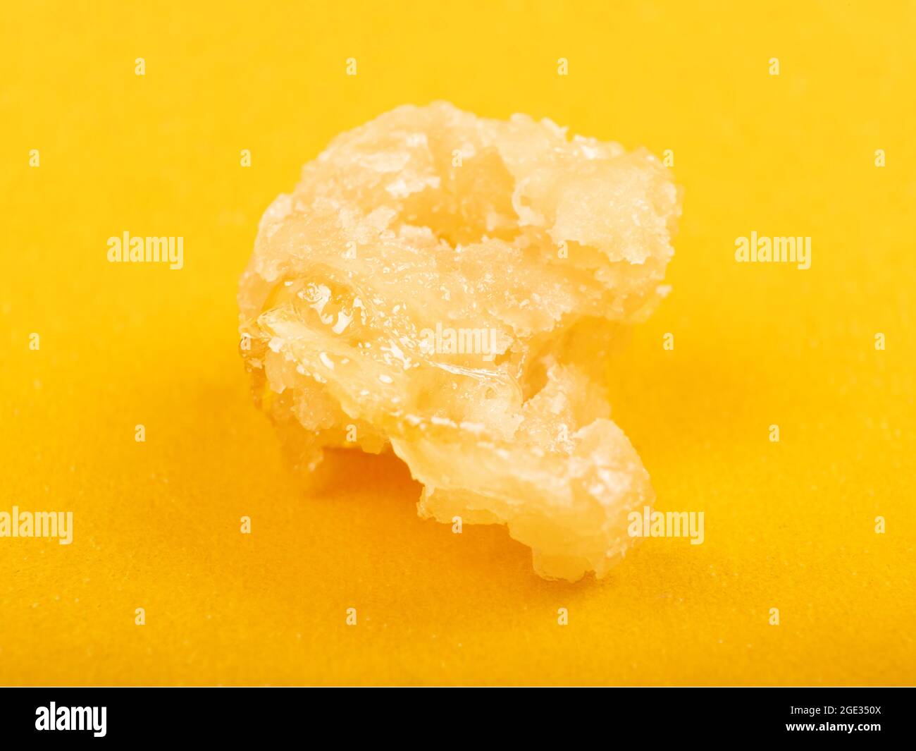 sugar cannabis wax concentrate close up on yellow background Stock ...