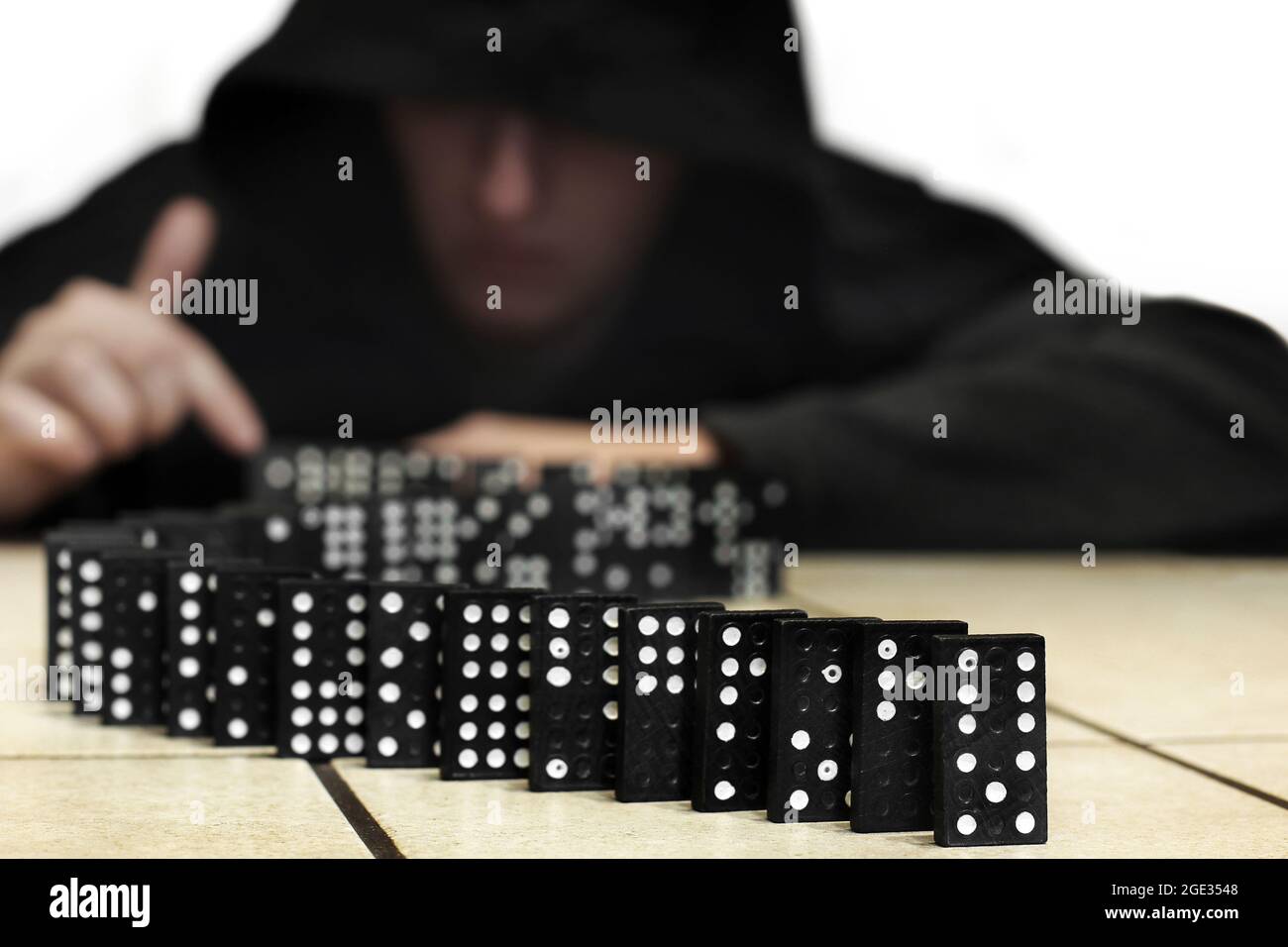 Guy and dominoes hi-res stock photography and images - Alamy