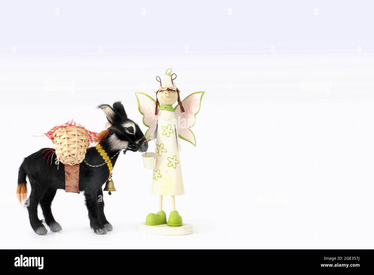 Angel and Donkey. Isolated on white background Stock Photo - Alamy