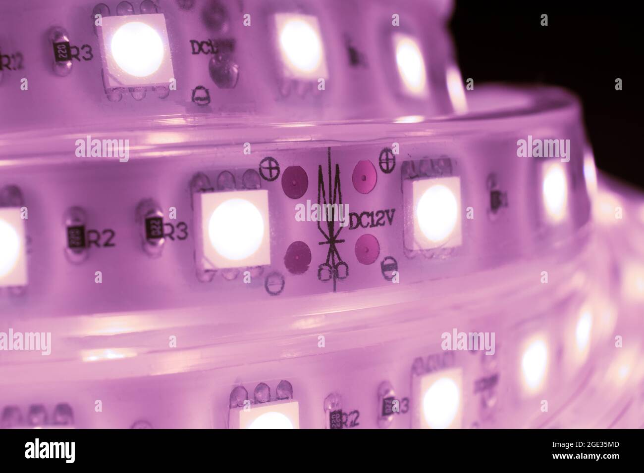 decorative led diode strip purple color in hand Stock Photo - Alamy