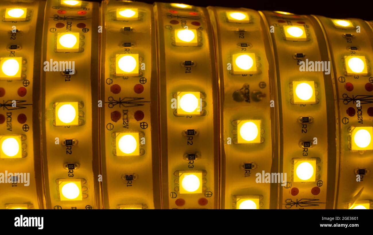 LED strip lights, shining yellow diodes tape Stock Photo - Alamy