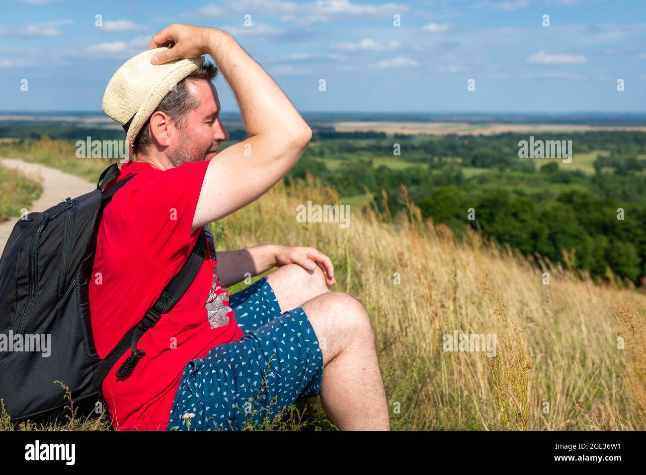 Traveler male relaxing meditation with serene view mountains forest ...