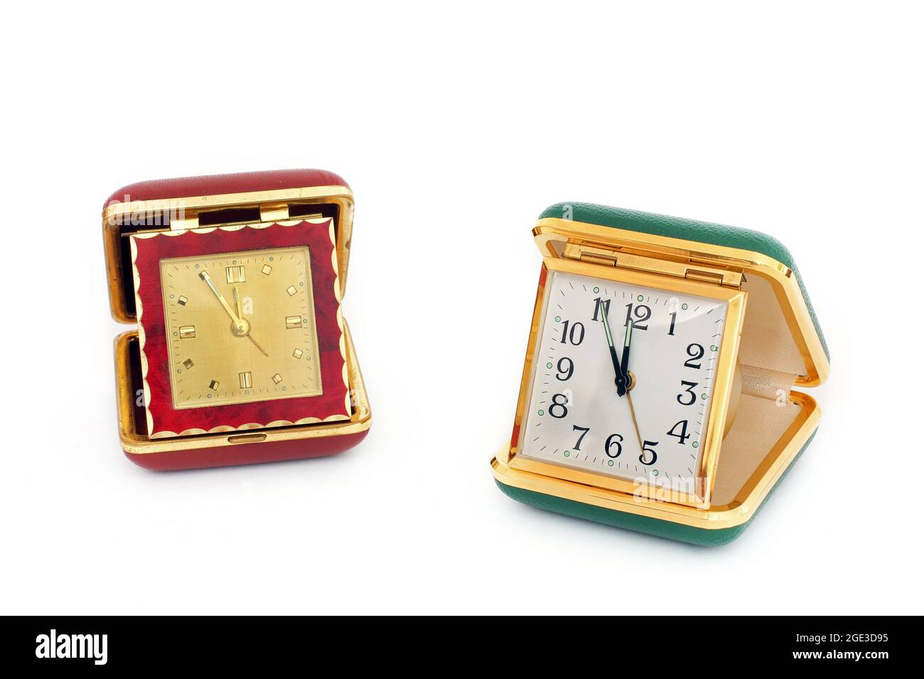 Old retro travel clock on a white background Stock Photo - Alamy