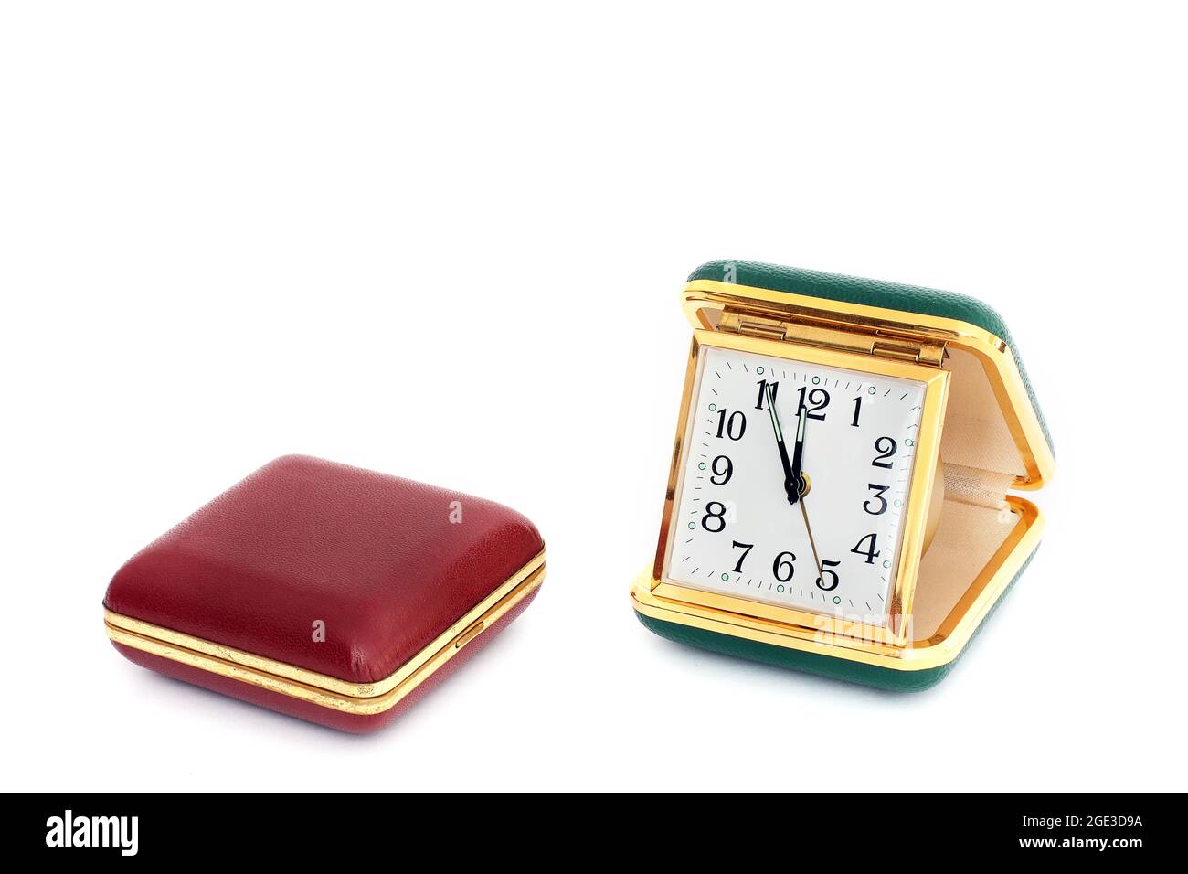 Old retro travel clock on a white background Stock Photo - Alamy