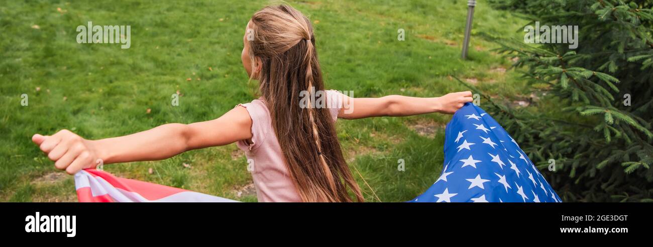 Child with american flag running on lawn, banner Stock Photo - Alamy