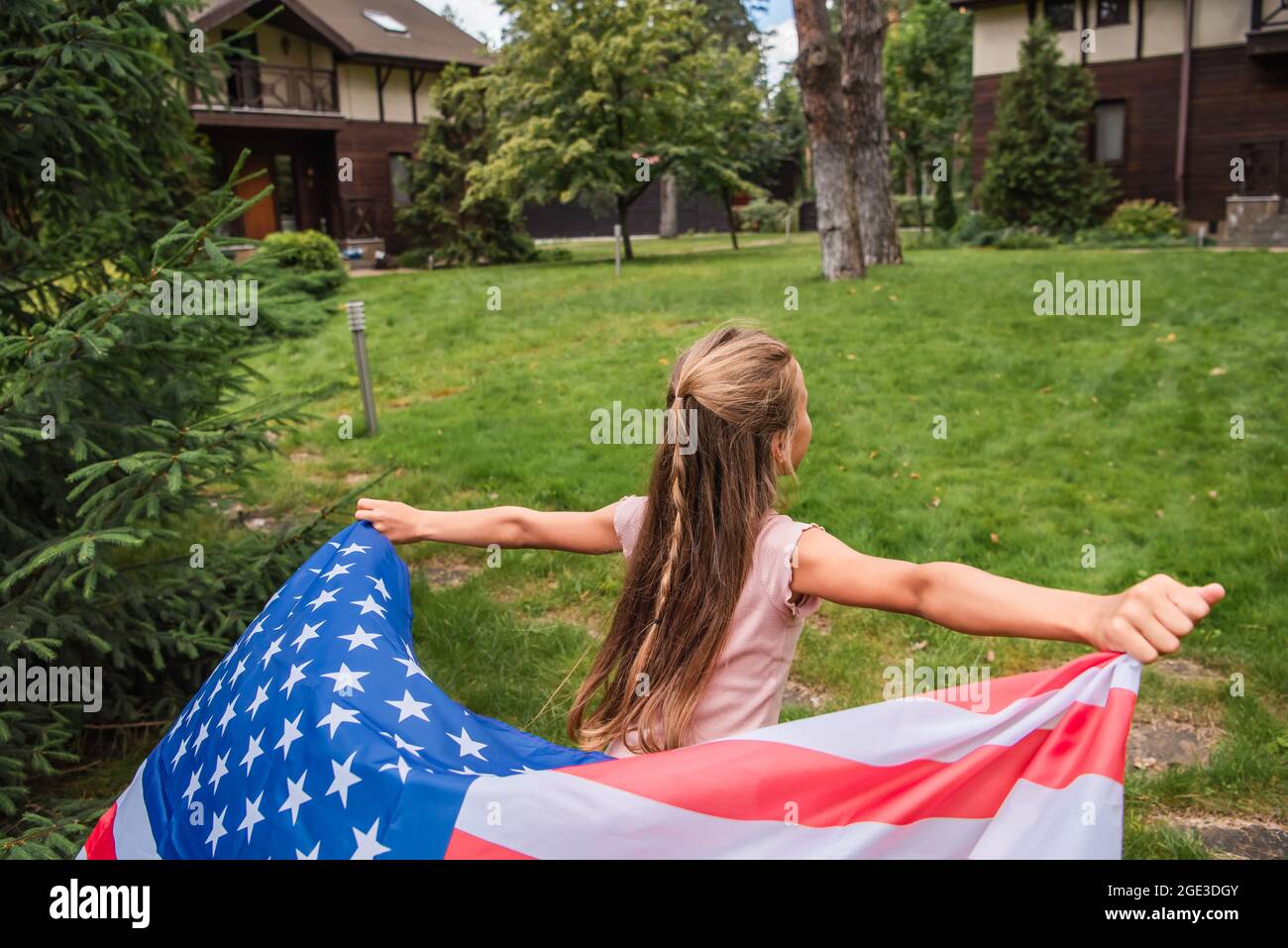Us girl running flag hi-res stock photography and images - Alamy