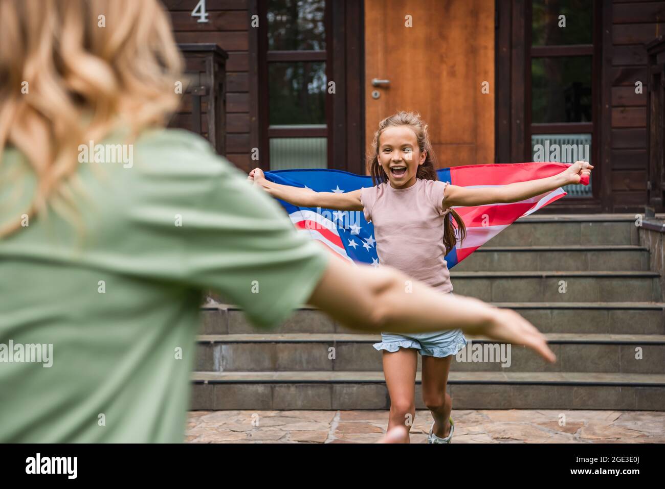 Us girl running flag hi-res stock photography and images - Alamy
