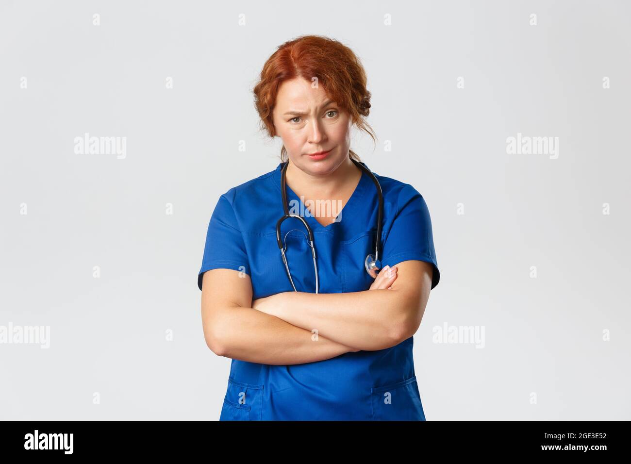 Medicine, healthcare and coronavirus concept. Skeptical and displeased ...