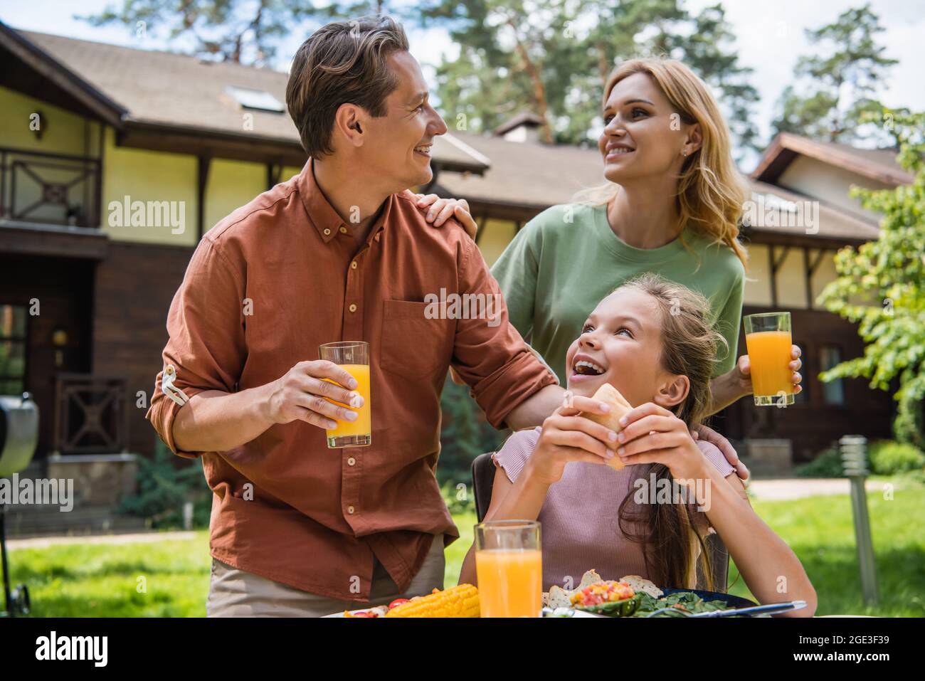 Father daughter talking together during hi-res stock photography and ...