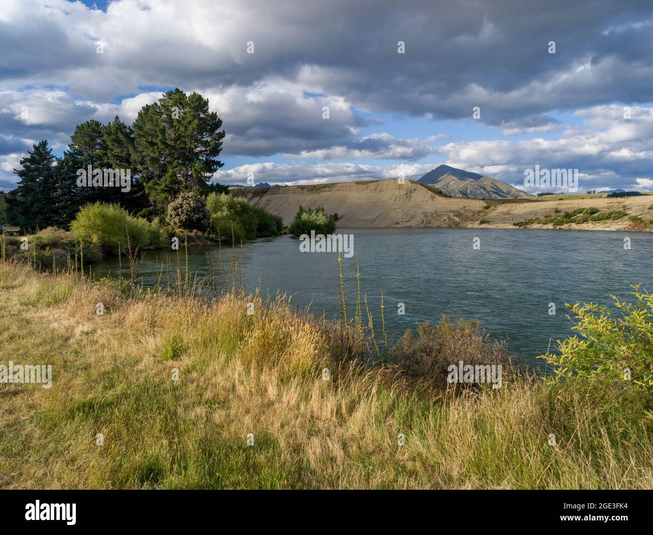 Lake with mountain range in the background, Albert Town, Wanaka, Otago ...
