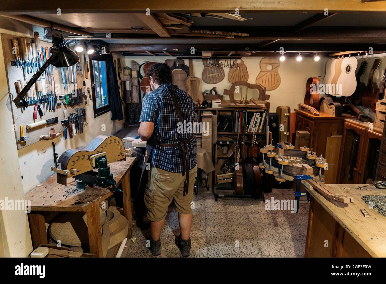 Luthier manufacturing a guitar hi-res stock photography and images - Alamy