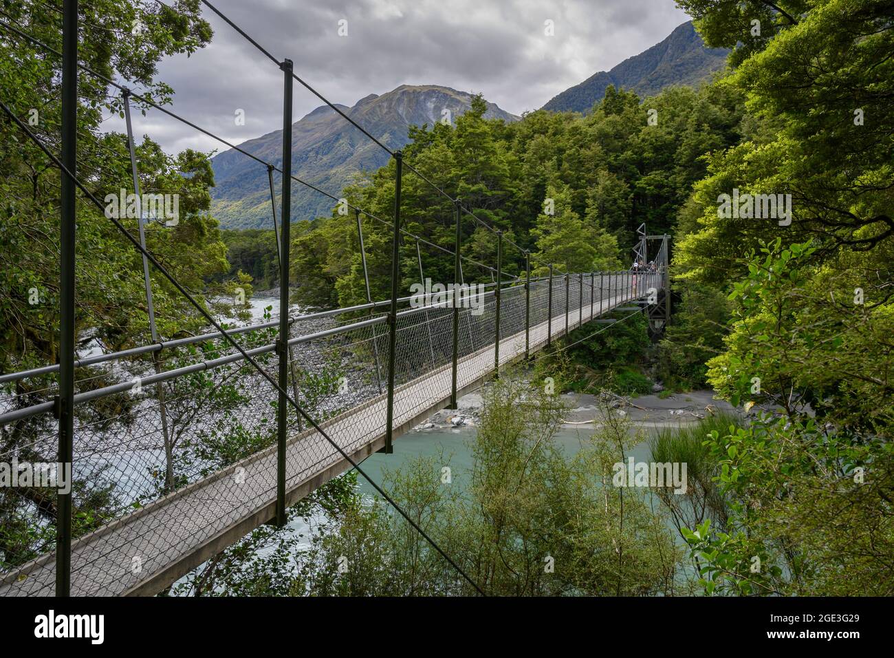 Suspension bridge over a river, Mt. Aspiring National Park, Makarora ...