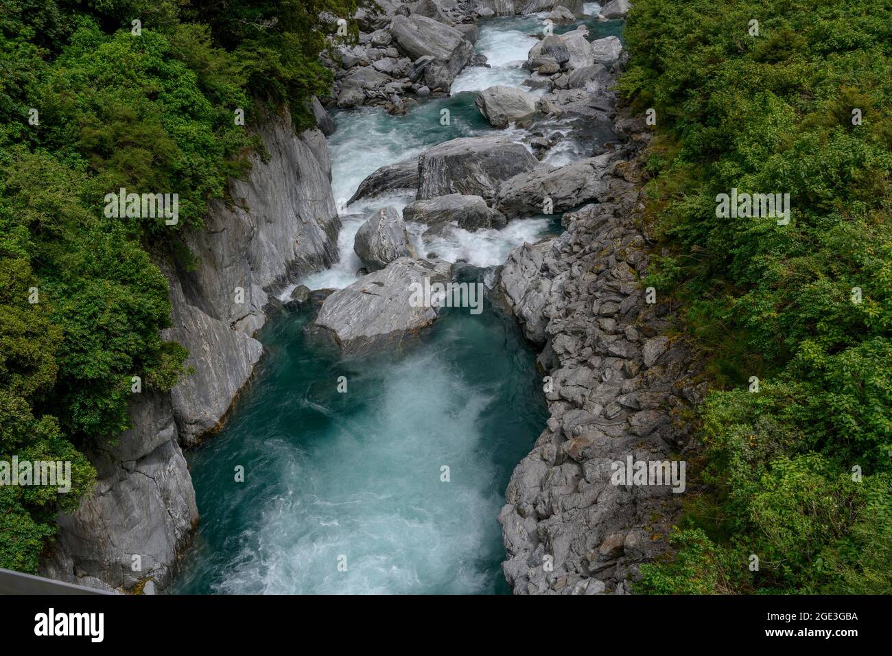 Elevated view of waterfall, Gates of Haast, Mt. Aspiring National Park ...