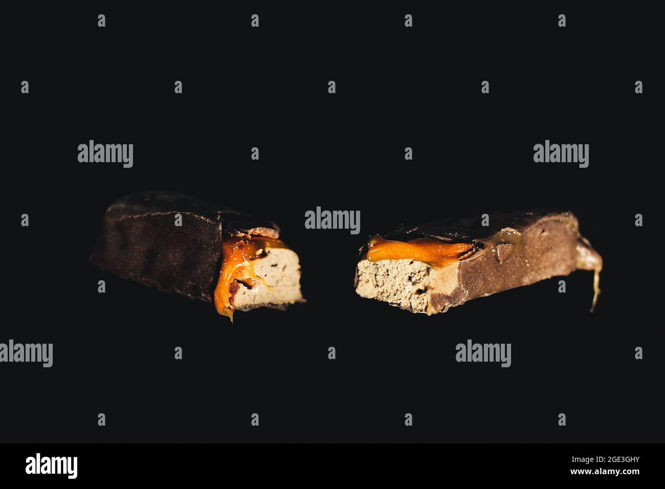 Chocolate bar. Flying chocolate bar isolated on black background ...