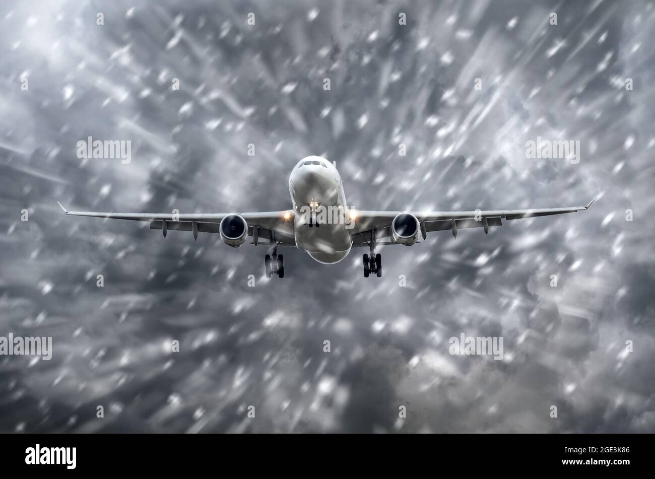 Airplane approaching on a landing in snowstorm bad weather Stock Photo ...