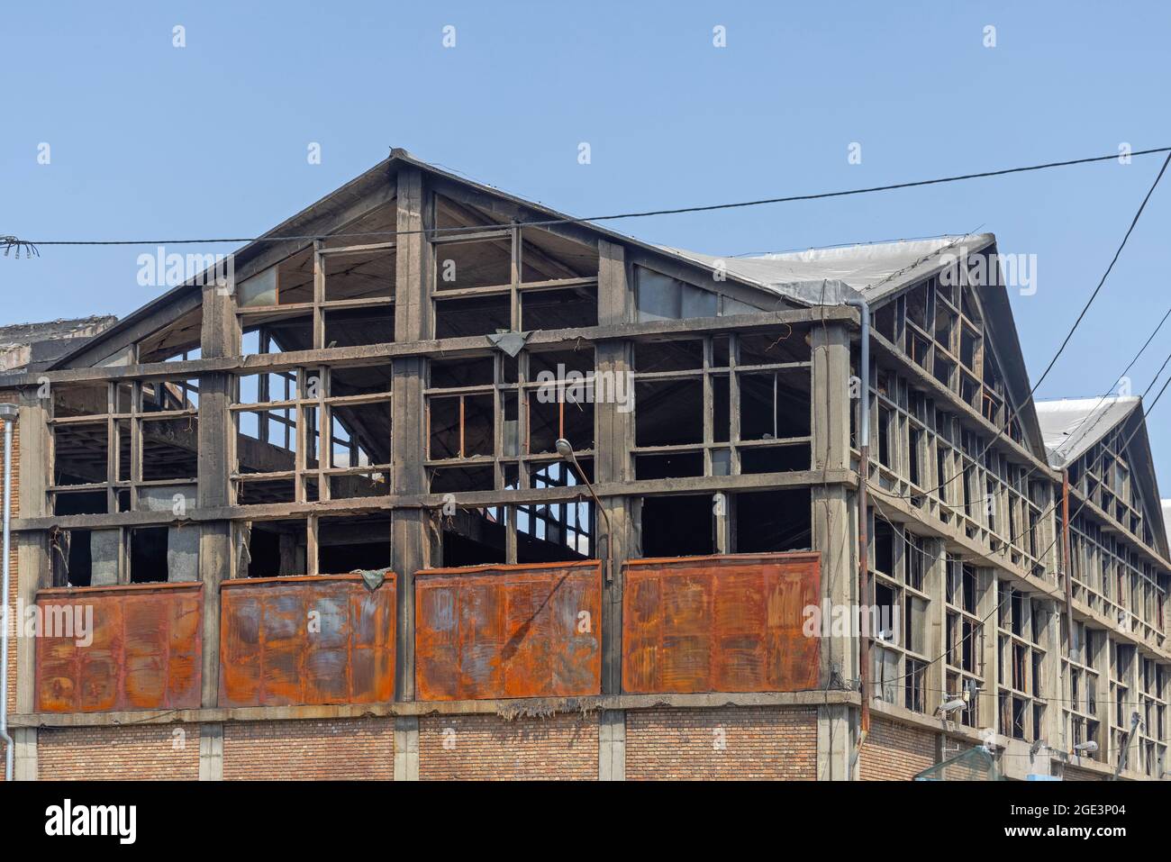 Big Factory Building Damaged by Fire Incident Stock Photo - Alamy
