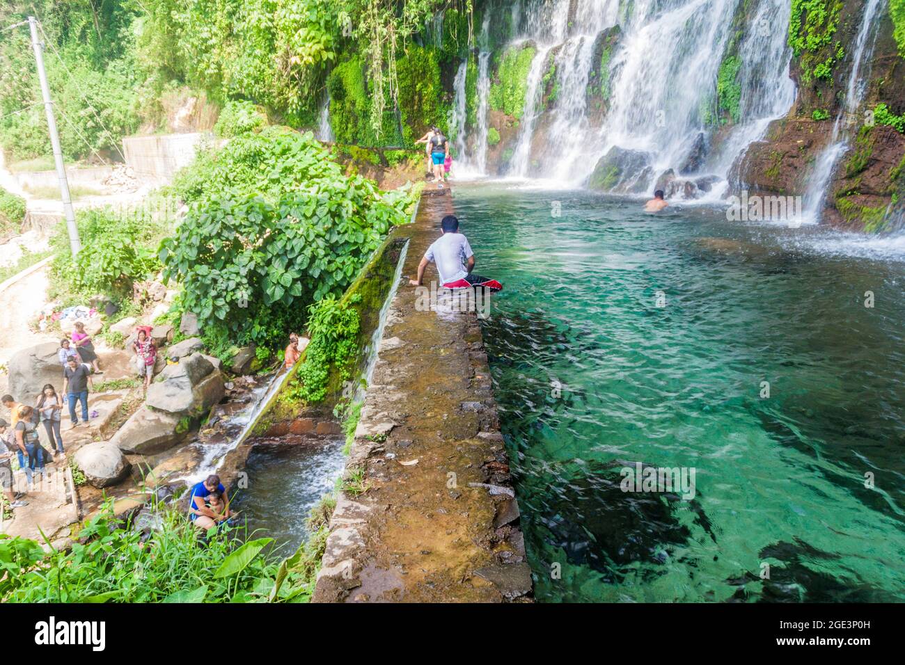 JUAYUA, EL SALVADOR - APRIL 3, 2016: People bathing in Chorros de la ...