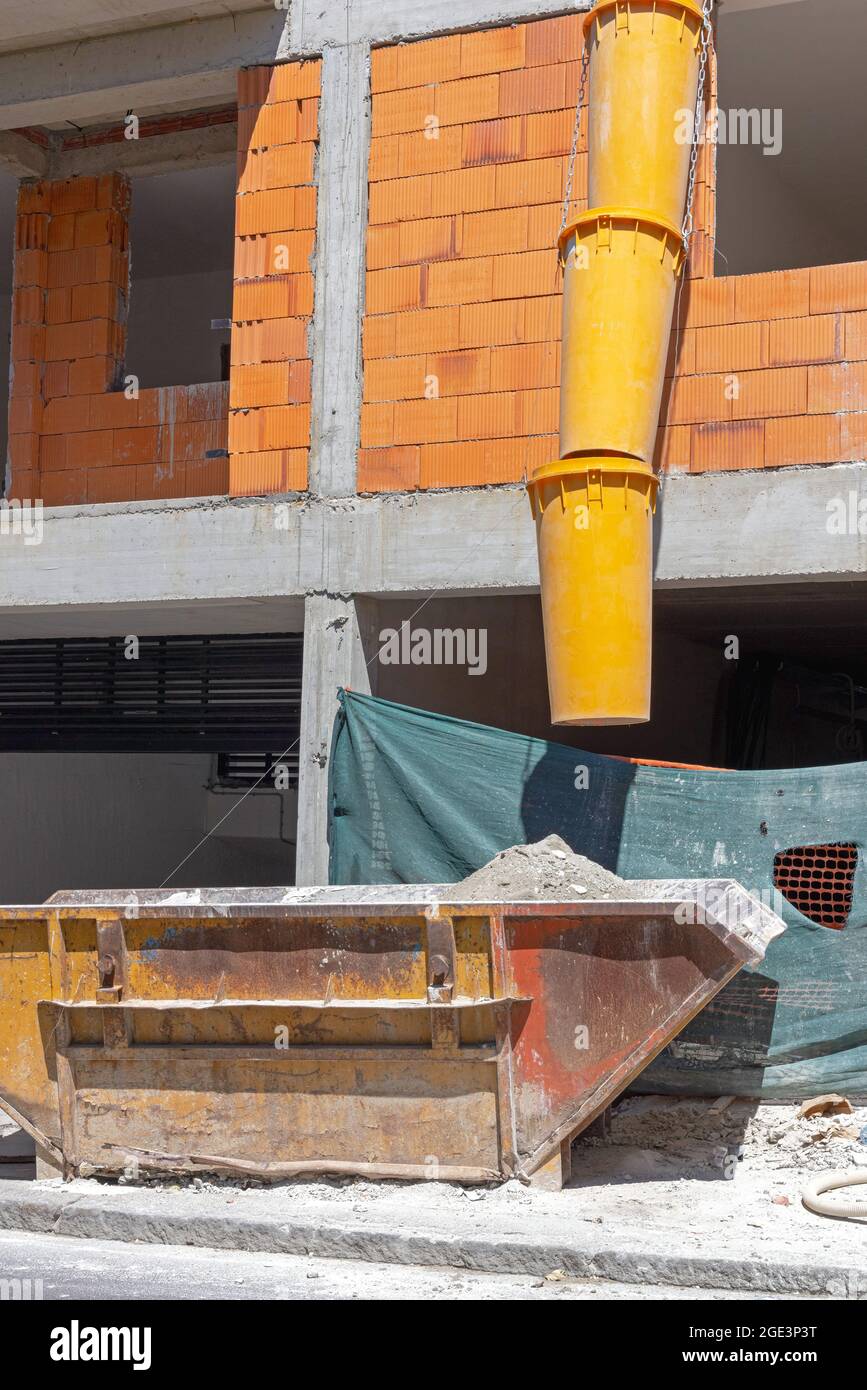 Waste chute building site hi-res stock photography and images - Alamy