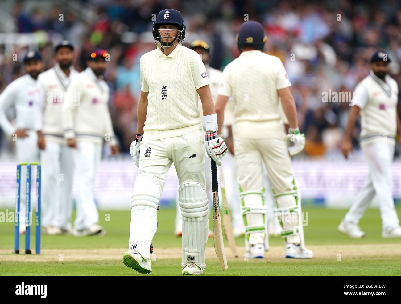 England's Joe Root looks dejected after being caught out by India's ...